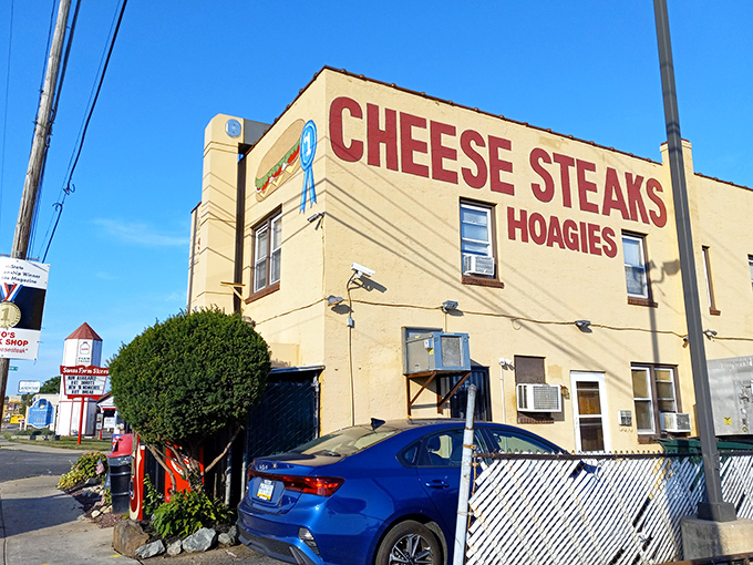 The unassuming yellow facade of Leo's Steak Shop stands as a beacon for sandwich aficionados, promising delicious treasures within those humble walls.
