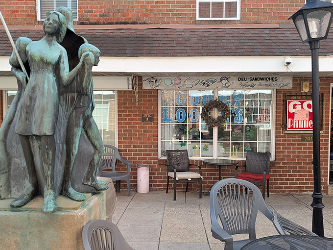 A neighborhood statue stands guard outside this South Philly sandwich sanctuary, where locals gather for cheesesteak perfection.