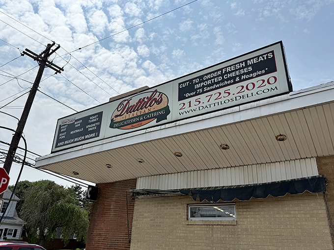 That classic sign promises everything a sandwich lover needs: fresh meats, imported cheeses, and hoagies worth crossing town for.