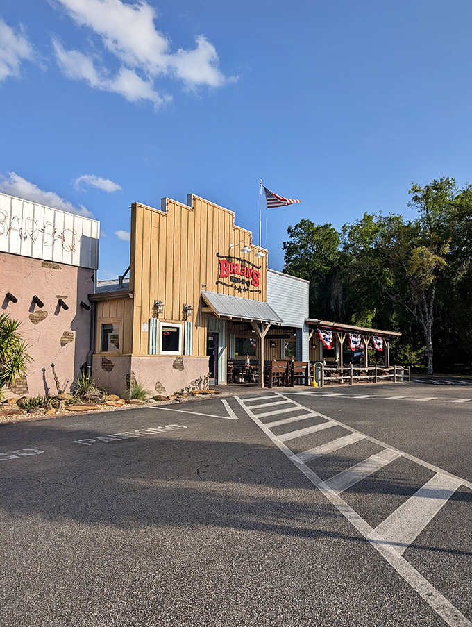 The Western-style facade of Brian's Bar-B-Que stands proudly under Florida's blue sky, promising smoky delights within those wooden walls.