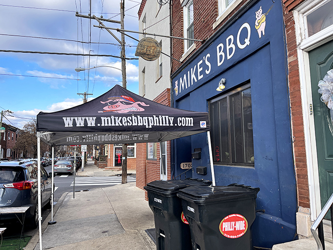 The blue storefront of Mike's BBQ stands like a beacon of smoky hope on East Passyunk Avenue, promising carnivorous delights within.