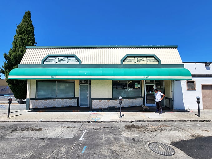 The teal awning of Jim's Coffee Shop beckons like an oasis in Alameda &ndash; a no-frills promise of comfort food that delivers every time.
