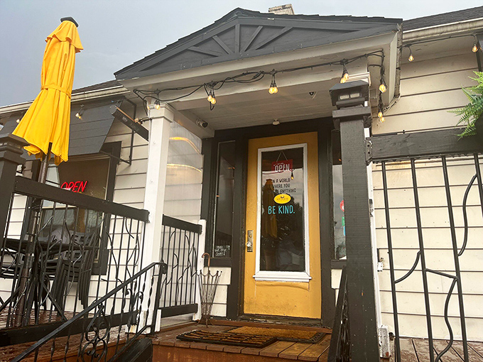 The unassuming yellow door with its simple "Be Kind" message is like a secret password to pasta paradise in Lakewood.