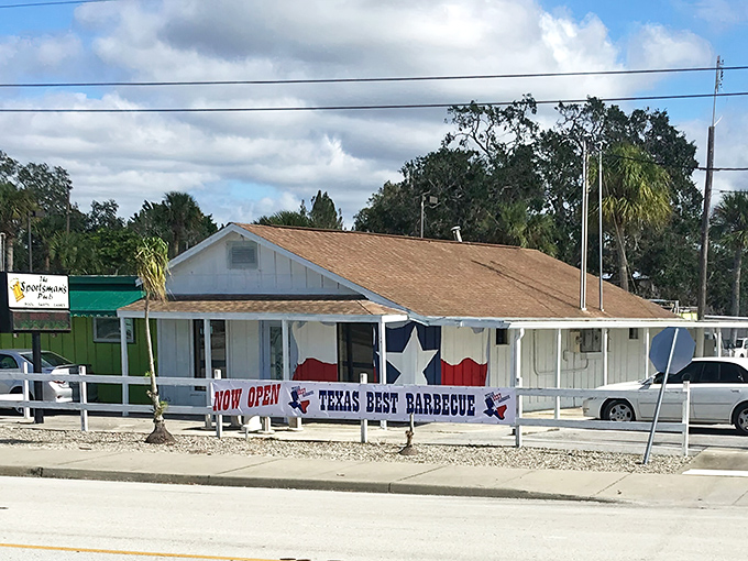 The unassuming exterior of Texas Best Barbecue in Englewood might fool you, but that Texas flag mural? It's a smoke signal of deliciousness waiting inside.