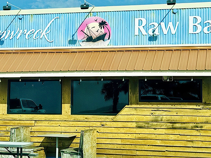 The weathered wooden exterior and bright blue corrugated metal isn't trying to impress you&mdash;it's saving all that energy for what's on your plate.