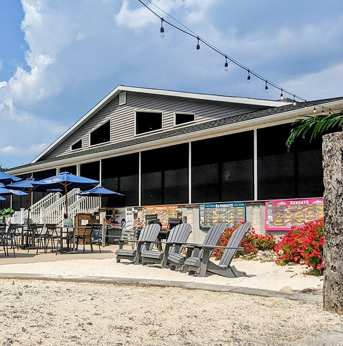 Waterfront escape hiding in plain sight! Pier 87's inviting exterior with Adirondack chairs and sandy "beach" proves Pennsylvania knows how to do coastal vibes without the coast.