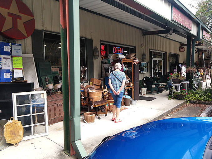 Even the storefront whispers stories of treasures within, beckoning collectors like moths to vintage flame.