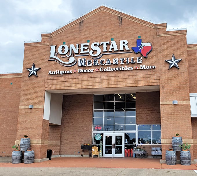 The brick facade of Lone Star Mercantile stands like a temple to Texas treasures, complete with iconic stars flanking the entrance&mdash;vintage hunting paradise awaits inside.