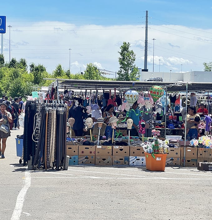 The outdoor market transforms an ordinary parking lot into a bazaar of possibilities. One person's mannequin head collection is another's design inspiration.