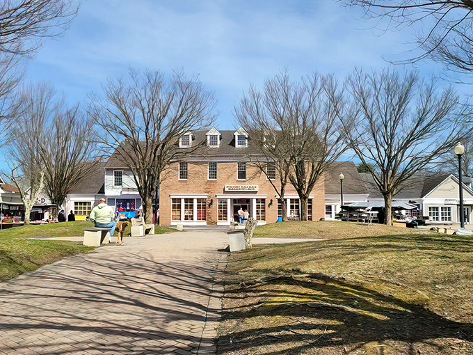 The colonial-style charm of Pocono Bazaar welcomes treasure hunters with its brick facade and dormer windows—architectural foreplay for the bargain bonanza within.