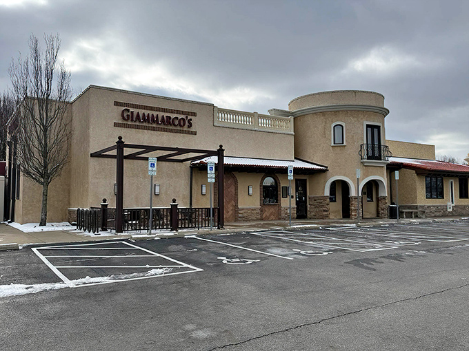 The Mediterranean-inspired exterior of Giammarco's glows invitingly at night, its stucco walls and stone accents promising Italian comfort within.