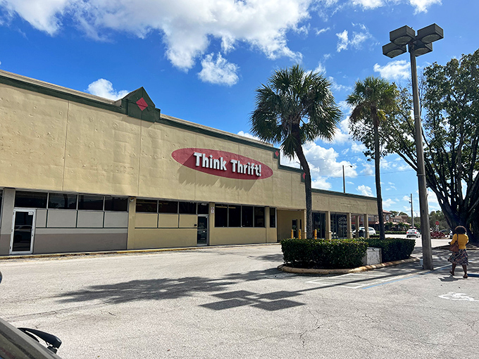 Palm trees stand sentinel outside this temple of secondhand treasures. Under Florida's blue skies, this beige building houses a universe where yesterday's discards become tomorrow's conversation pieces.
