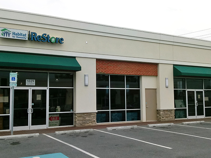 The unassuming storefront hides a wonderland of treasures within. Like finding a secret speakeasy, but instead of cocktails, you'll discover furniture bargains.