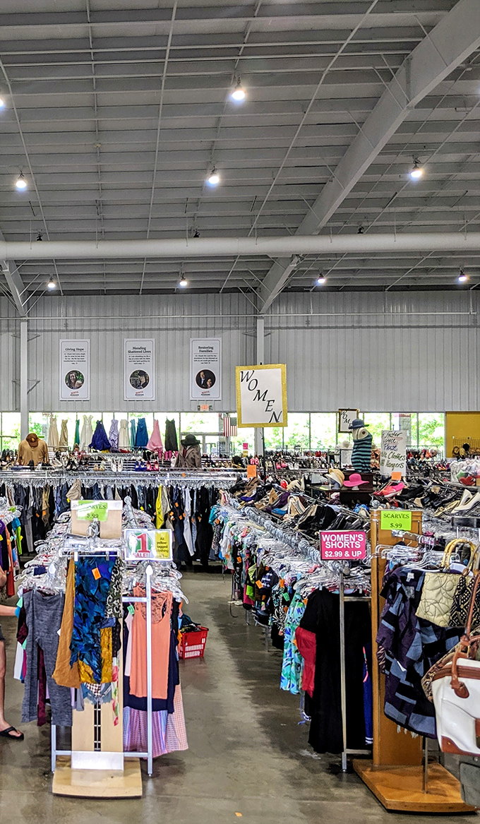 The women's clothing section stretches as far as the eye can see, like a department store where everything comes with a backstory.