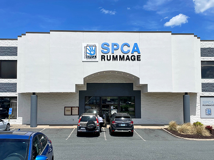 The SPCA Rummage Store's distinctive fa&ccedil;ade stands out against Charlottesville's blue sky, promising treasure hunters a day of bargain-finding while supporting furry friends in need.