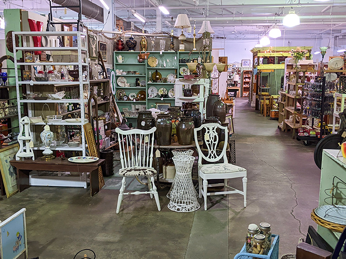 Vintage chairs with character await new homes amid shelves of treasures. Every aisle promises discoveries that'll make you say, "My grandmother had one of those!"