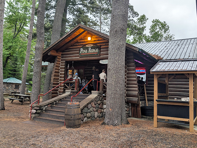 Nestled among towering pines, this authentic log cabin restaurant isn't trying to impress anyone—until you taste what's cooking inside.