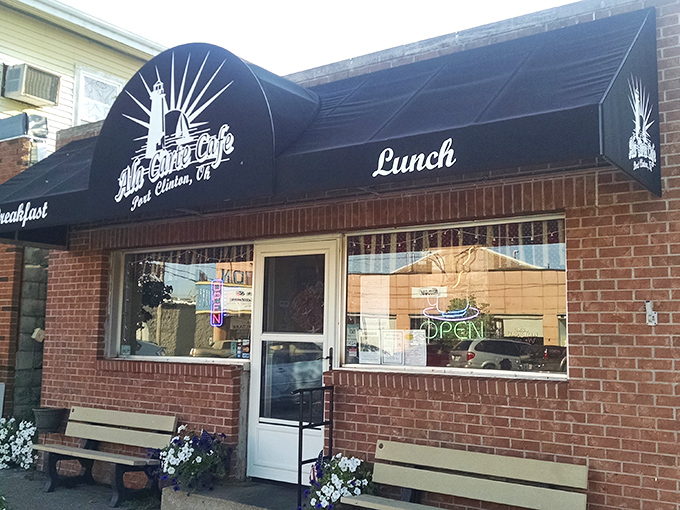 The classic black awning with lighthouse logo promises no pretension, just honest food. Port Clinton's brick-front treasure stands ready for hungry visitors.