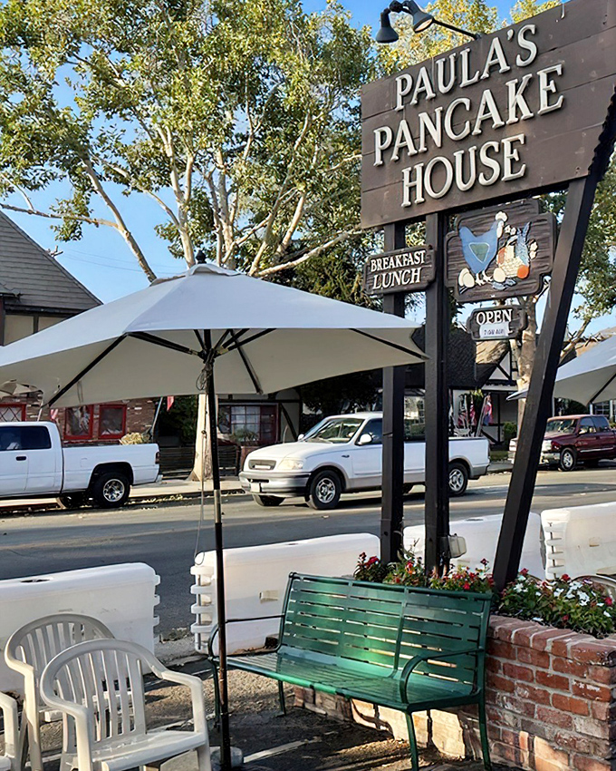 The wooden sign beckons like an old friend &ndash; Paula's Pancake House, where breakfast dreams come true under California sunshine and Danish-inspired charm.
