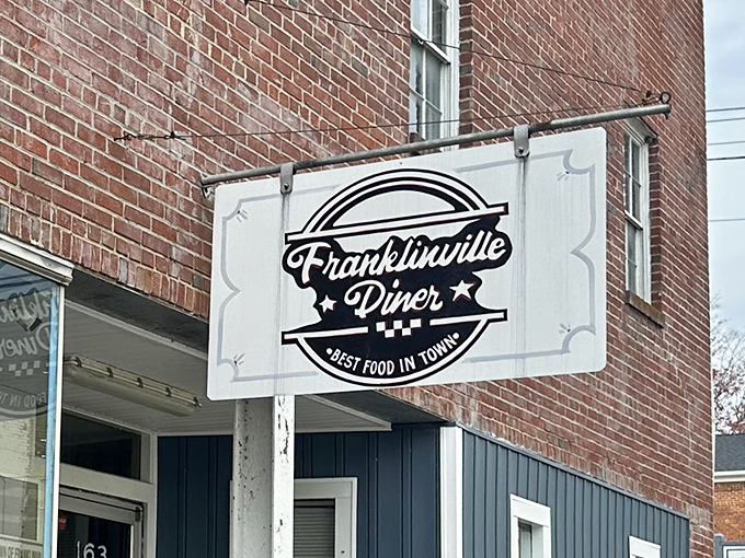 The classic brick exterior and vintage sign promise exactly what you want from a diner: no pretense, just "Best Food in Town" honesty.
