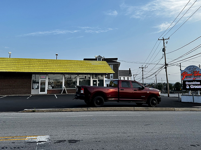 The iconic yellow-roofed building has witnessed countless morning rushes, first dates, and "just because" treat runs over the years.
