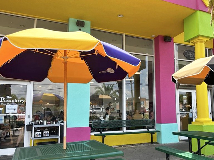 The Pancakery's rainbow-bright exterior isn't just eye-catching&mdash;it's practically screaming "Wake up, sunshine! Breakfast magic happens here!"