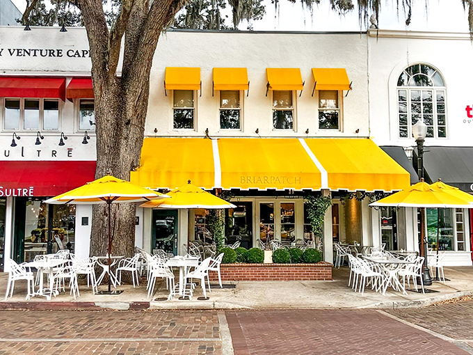 The sunshine-yellow awning of Briarpatch isn't just a color choice&mdash;it's a promise of the bright flavors waiting inside this Winter Park gem.
