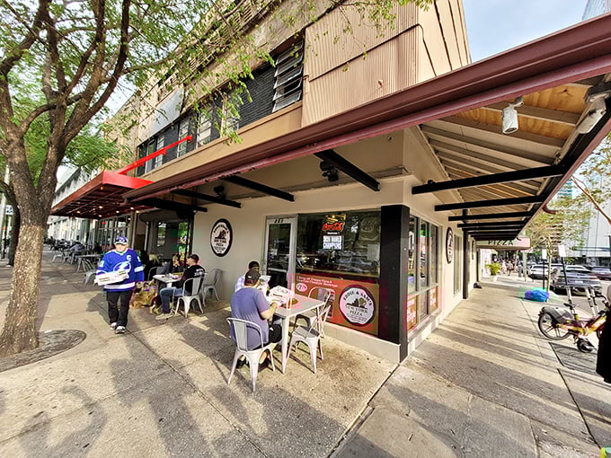 Outdoor seating where pizza dreams come true &ndash; watch Tampa's urban life unfold while that New York-style slice cools just enough to devour.