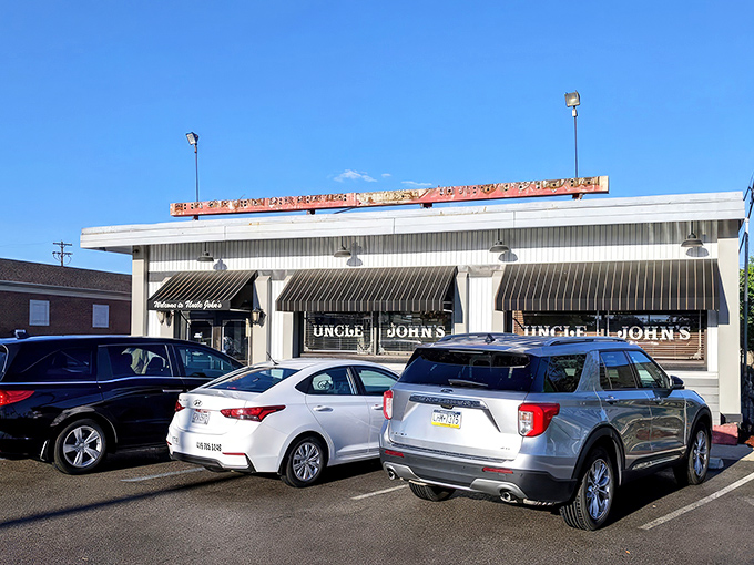 The unassuming exterior of Uncle John's Pancake House hides a breakfast paradise within. Like finding a treasure chest disguised as a shoebox.