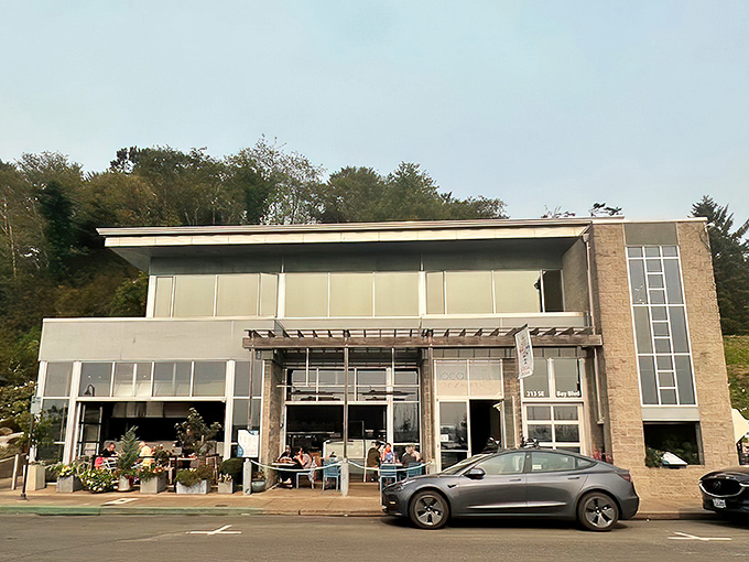 Another angle reveals the restaurant's clean lines and large windows, where the boundary between dining room and dockside blurs into seafood perfection.