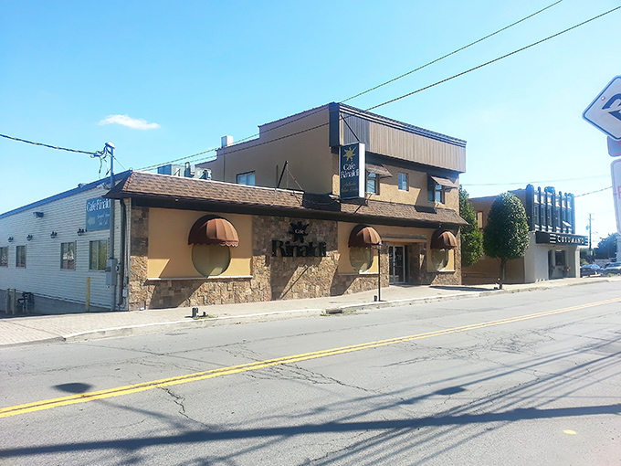 The unassuming exterior of Cafe Rinaldi hides Old Forge's greatest treasure &ndash; rectangular pizza trays worth crossing state lines for.