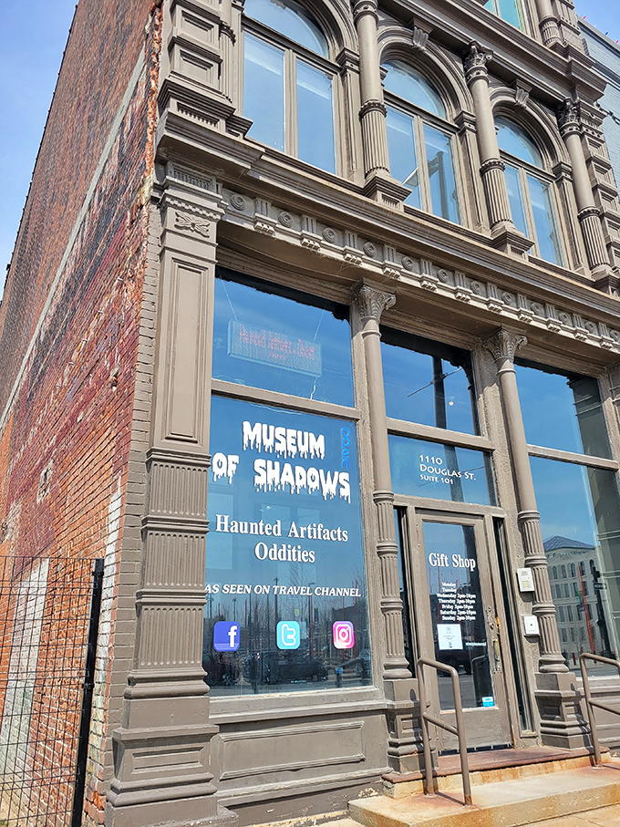 The historic fa&ccedil;ade of the Museum of Shadows beckons with ominous charm. Those dripping letters aren't just for show&mdash;they're practically a warning label.