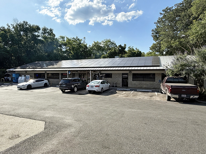 The unassuming exterior of Pearl's promises what fancy restaurants rarely deliver&mdash;authentic flavor without the fuss. Those blue benches have heard decades of post-meal satisfaction sighs.