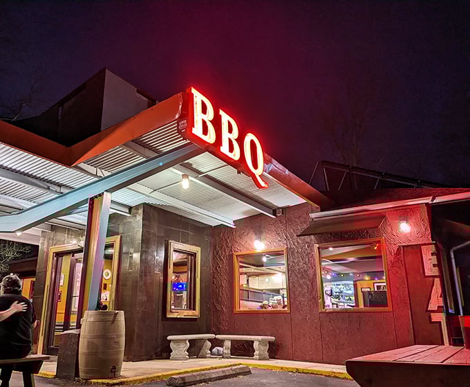By night, the BBQ sign transforms into a beacon of hope for the hungry, like a North Star for meat lovers.