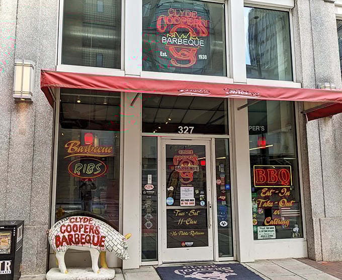 That pig statue isn't just decoration &ndash; it's the unofficial greeter, standing guard over decades of barbecue tradition and countless satisfied appetites.