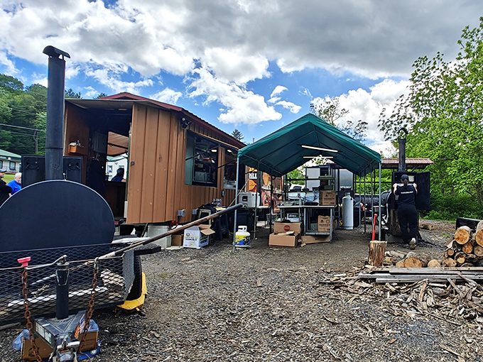 The humble wooden shack and smoker setup at Big Creek Bar-B-Q proves once again that culinary greatness often hides in unassuming packages.