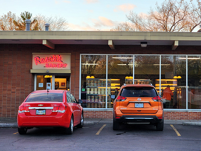 The glowing red neon sign of Resch's Bakery promises sweet salvation after a long day. Columbus comfort in brick form.