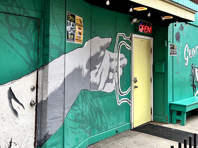 The unmistakable turquoise exterior of George's Lounge beckons like a culinary oasis in downtown Canton. That hand-painted mural isn't just decoration&mdash;it's a promise of good things to come.