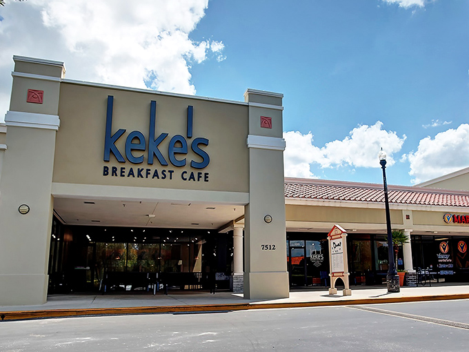 Keke's bold blue signage stands out against Florida's cloudless sky, like a beacon calling breakfast enthusiasts home to their morning sanctuary.