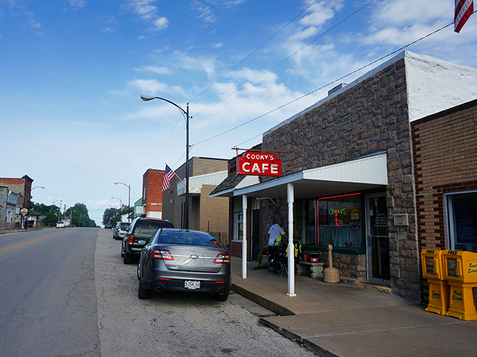 The unassuming storefront of Cooky's Cafe stands like a time capsule on Golden City's main street, its vintage red sign a beacon for hungry travelers.