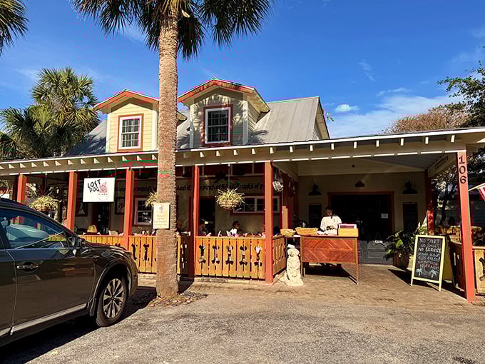 The cheerful yellow and red exterior of Lost Dog Cafe welcomes you like an old friend who happens to make the best breakfast in town.
