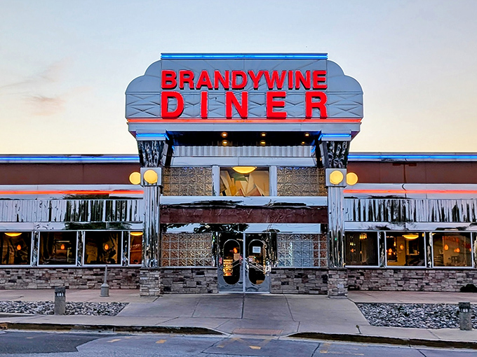 As dusk settles, the Brandywine Diner's illuminated fa&ccedil;ade transforms into a glowing temple of comfort food that promises delicious redemption for empty stomachs.
