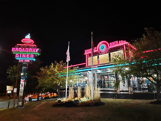 That neon glow promises serious comfort food magic &ndash; Broadway Diner's exterior welcomes you home before you even step inside.