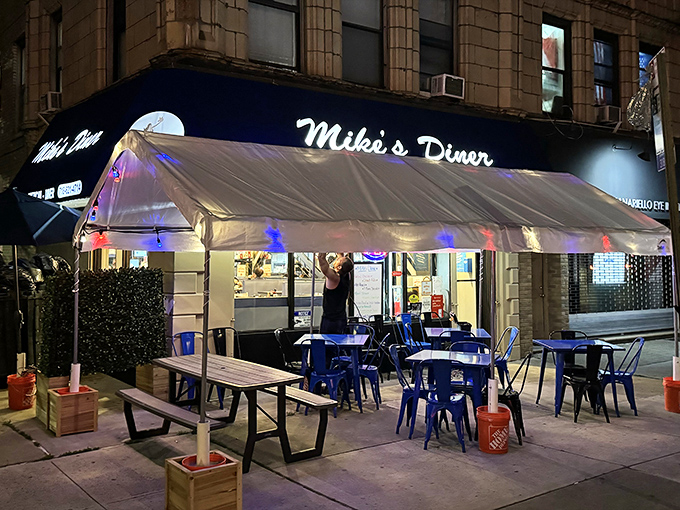 Dinner is served! The outdoor setup, glowing on a cool night, feels like a neighborhood block party with delicious comfort food.