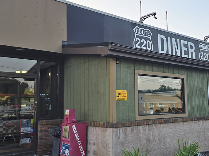 No neon, no fuss, just that classic green paneling and bold signage announcing what matters: good food awaits inside this Bedford institution.