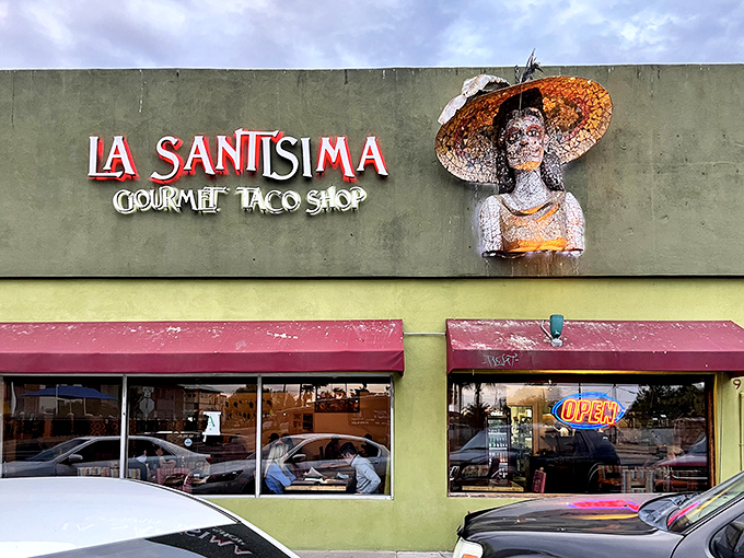 The iconic fa&ccedil;ade of La Santisima stands out with its vibrant yellow and red trim, like a delicious postcard from Mexico that somehow landed in Phoenix.