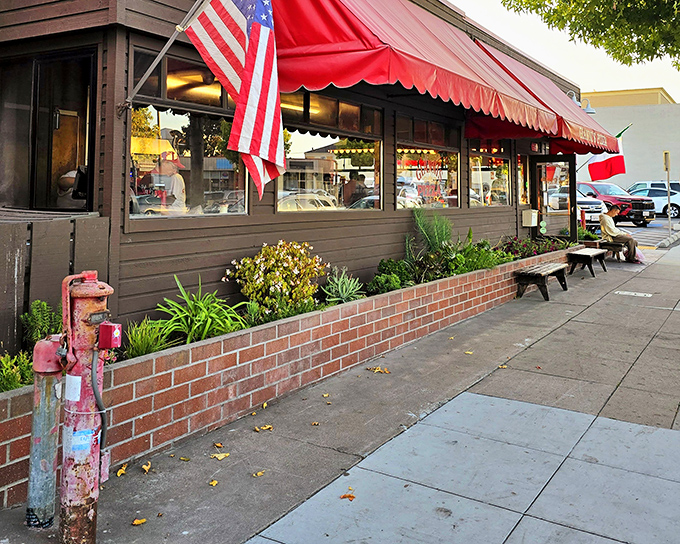 That red awning waves like a delicious flag of surrender to hunger pangs everywhere.