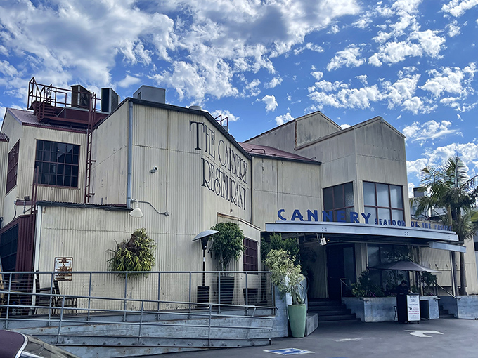 The weathered exterior of The Cannery speaks volumes - industrial chic before it was trendy, with a side of authentic coastal character.
