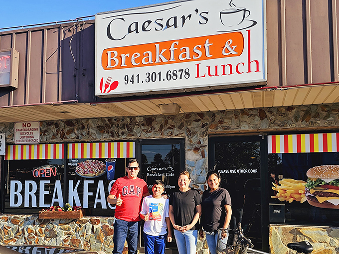 Happy diners pose outside Caesar's, their smiles saying what words can't &ndash; they've found breakfast nirvana in Bradenton.