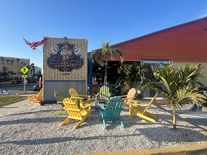 Those colorful Adirondack chairs aren't just seating—they're an invitation to slow down and embrace Florida's coastal vibe at The Conch Republic Grill.